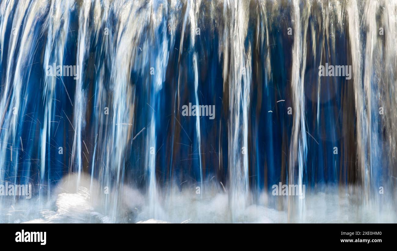 Running water from a waterfall. Natural liquid background. Close-up ...