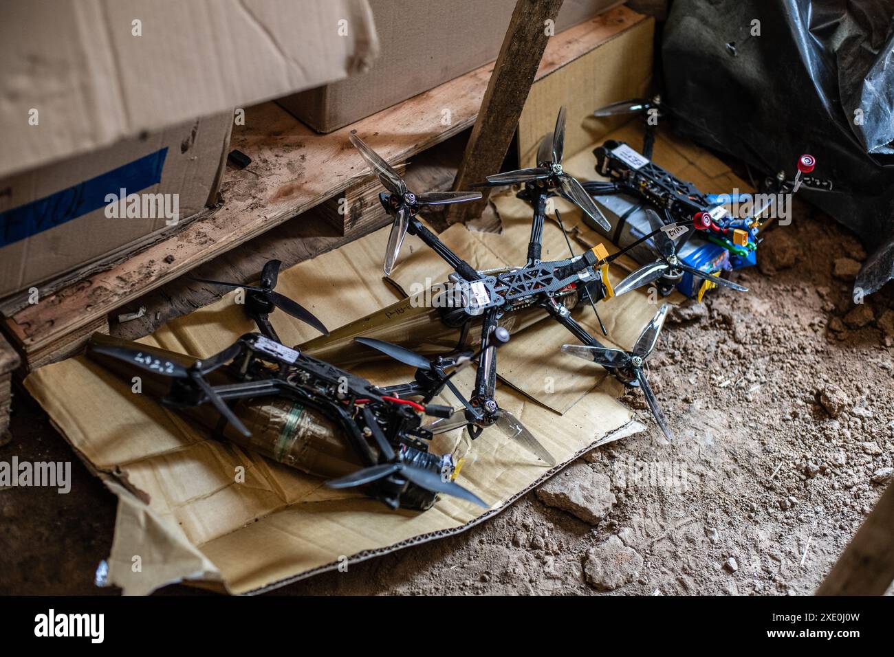FPV drones with explosives attached to them are seen inside a bunker ...