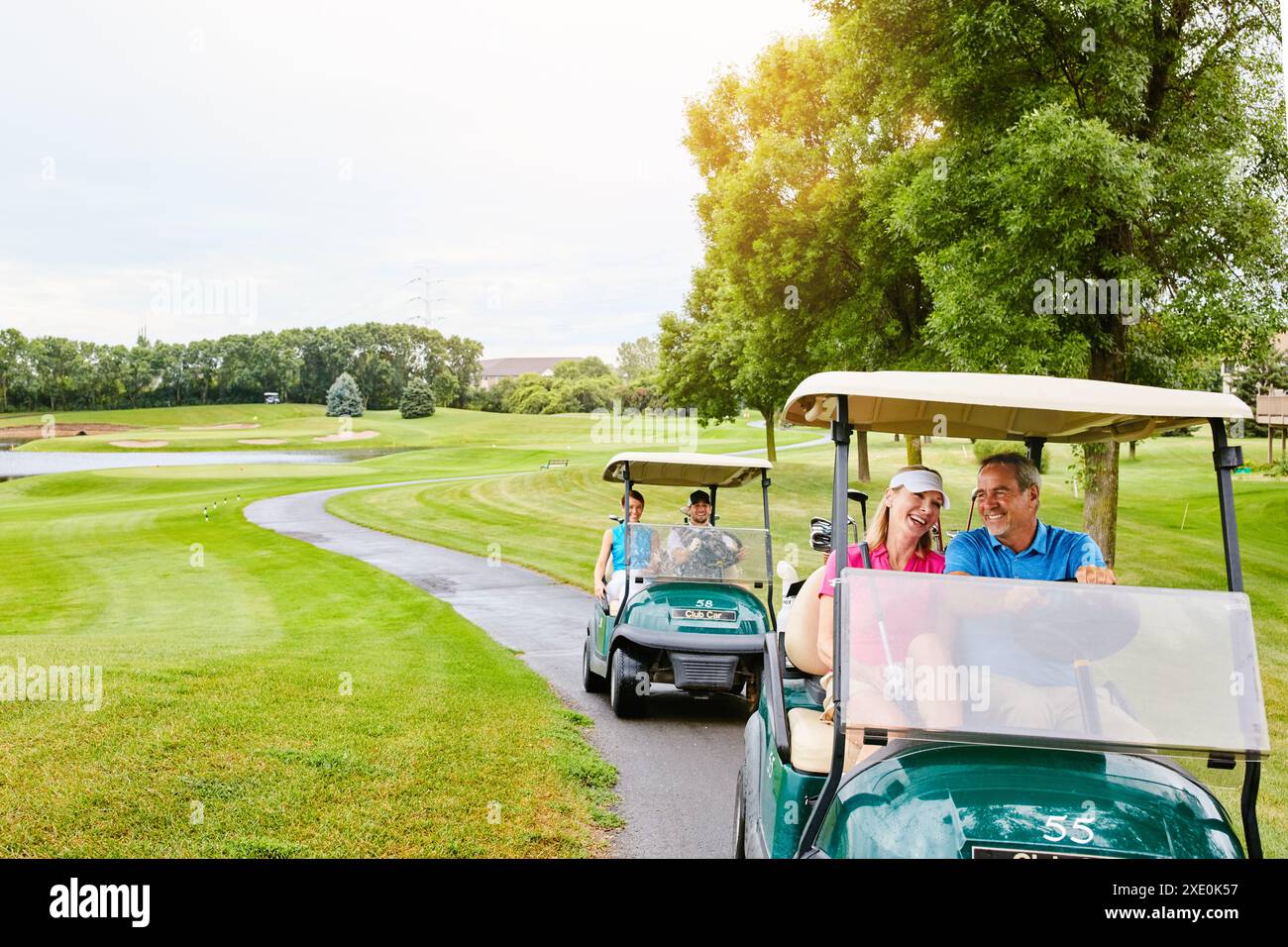 People, golf cart and outside course in nature, happy and relax in ...