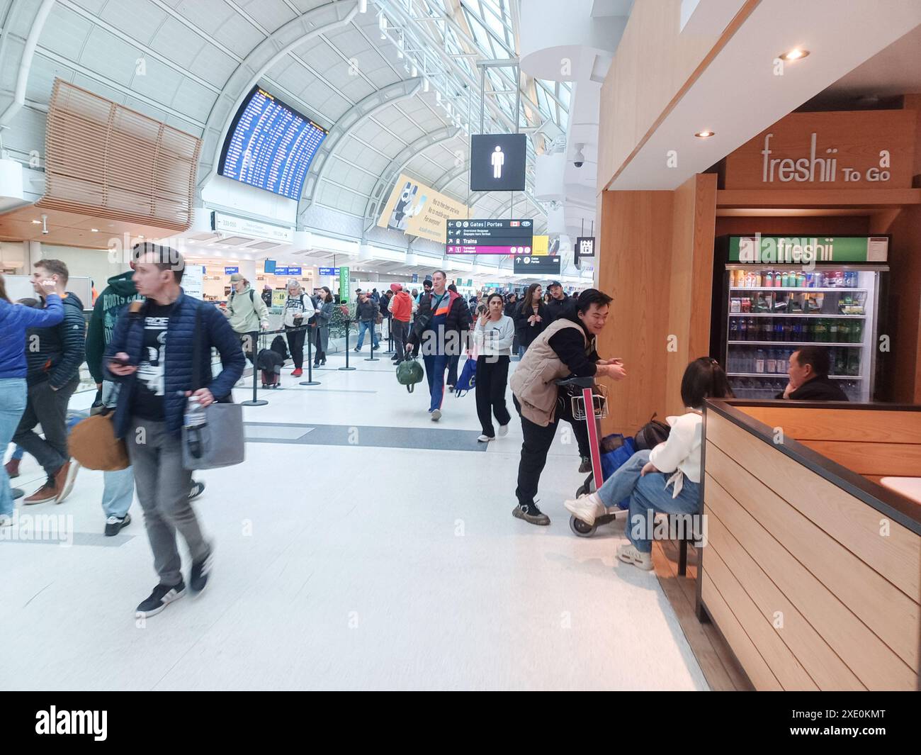 Toronto, ON, Canada - June 21, 2024: Inside view of the Toronto Pearson International Airport ...