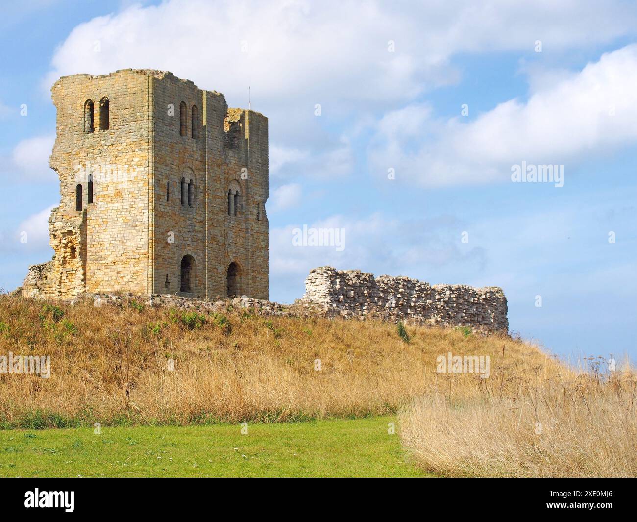 Hilltop view of the keep and wall of the ruined historic Scarborough ...