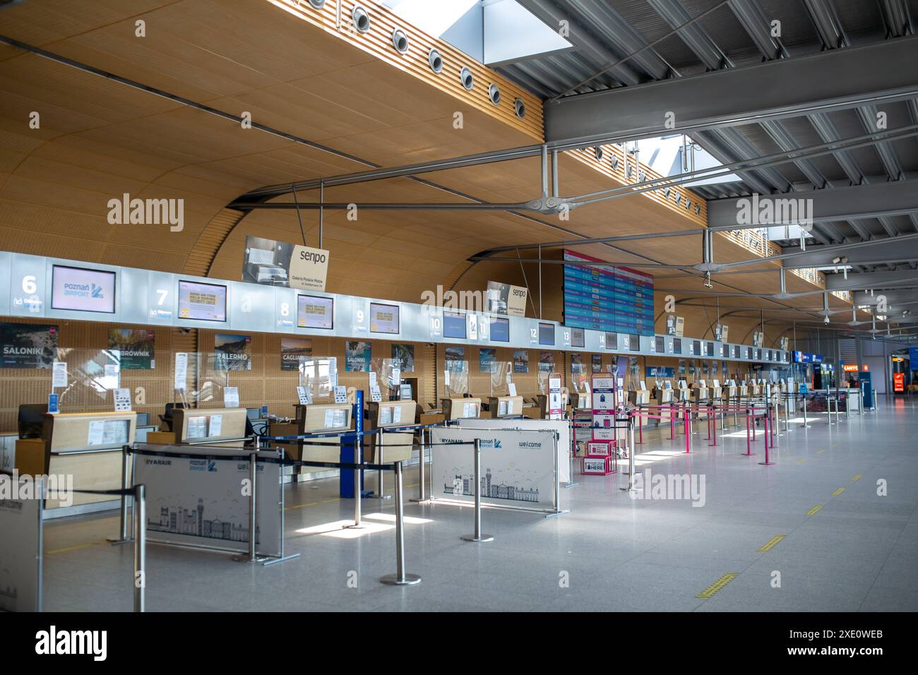 Poznan, Poland - June 18, 2024: Empty check-in counters at Poznan ...