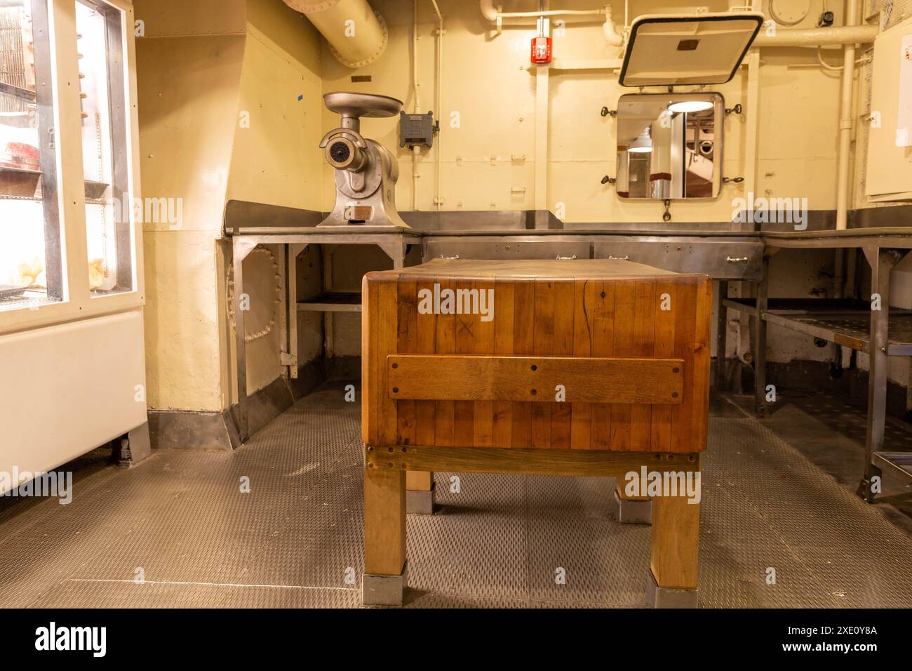 A galley aboard a World War II United States Navy battleship with a ...