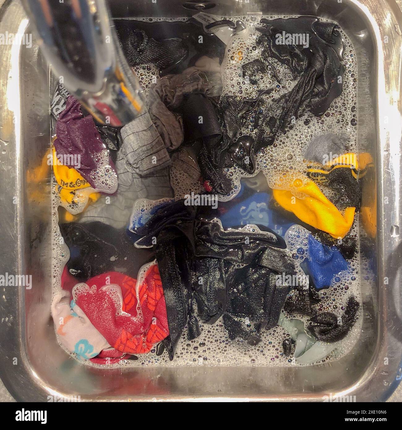 Hand washing clothes hi-res stock photography and images - Alamy