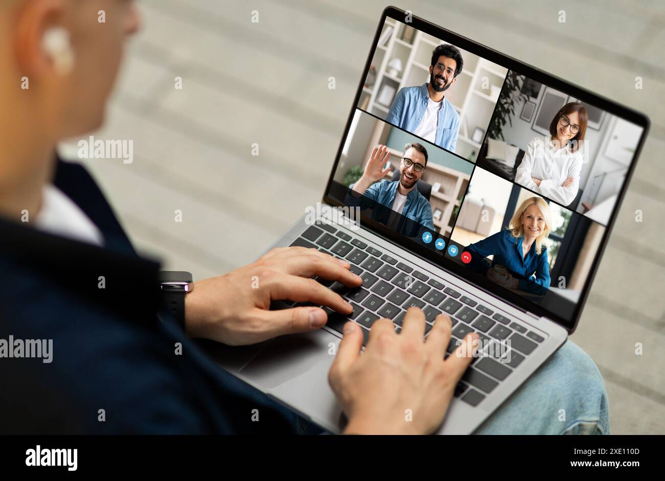 Participating online group video conference hi-res stock photography ...
