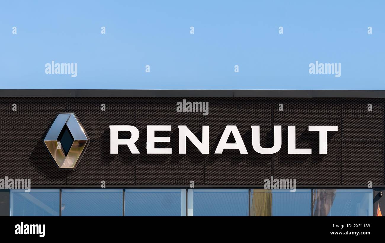 Renault. A sign with the Renault logo on the dealership building Stock ...