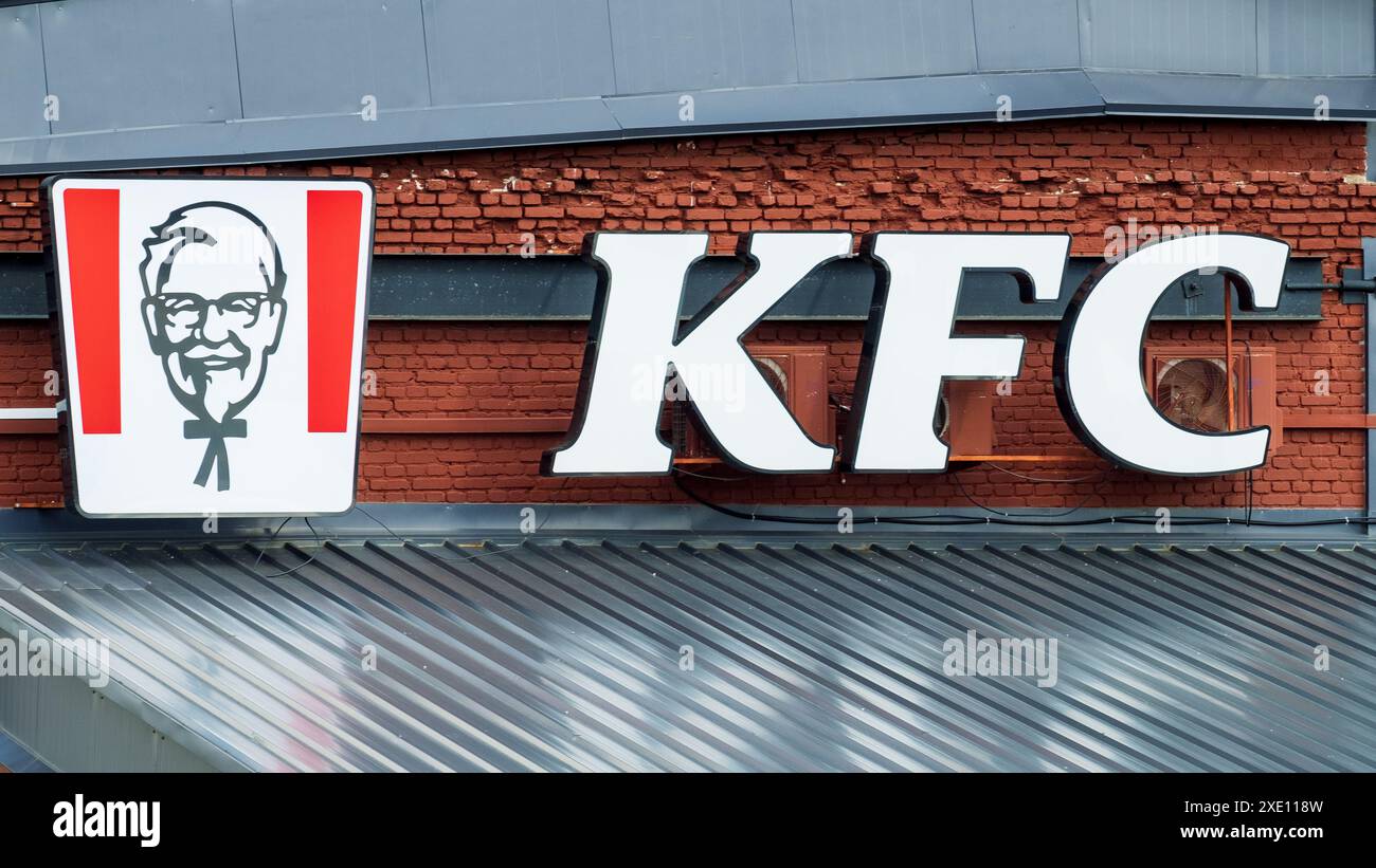 Minsk, Belarus - May 31, 2022: Signage on a brick wall KFC fast food ...