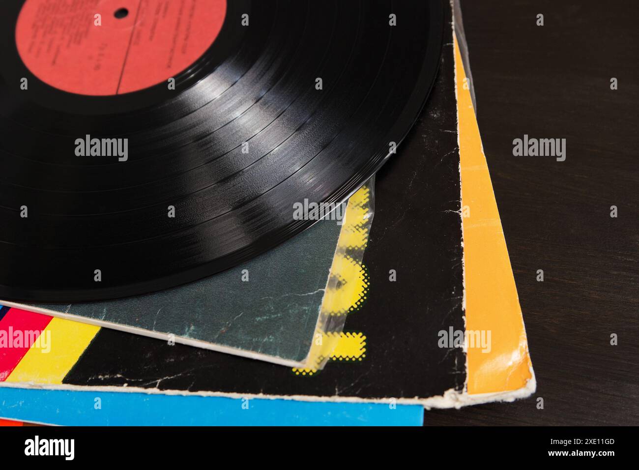 Vinyl recording disk and different albums Stock Photo - Alamy