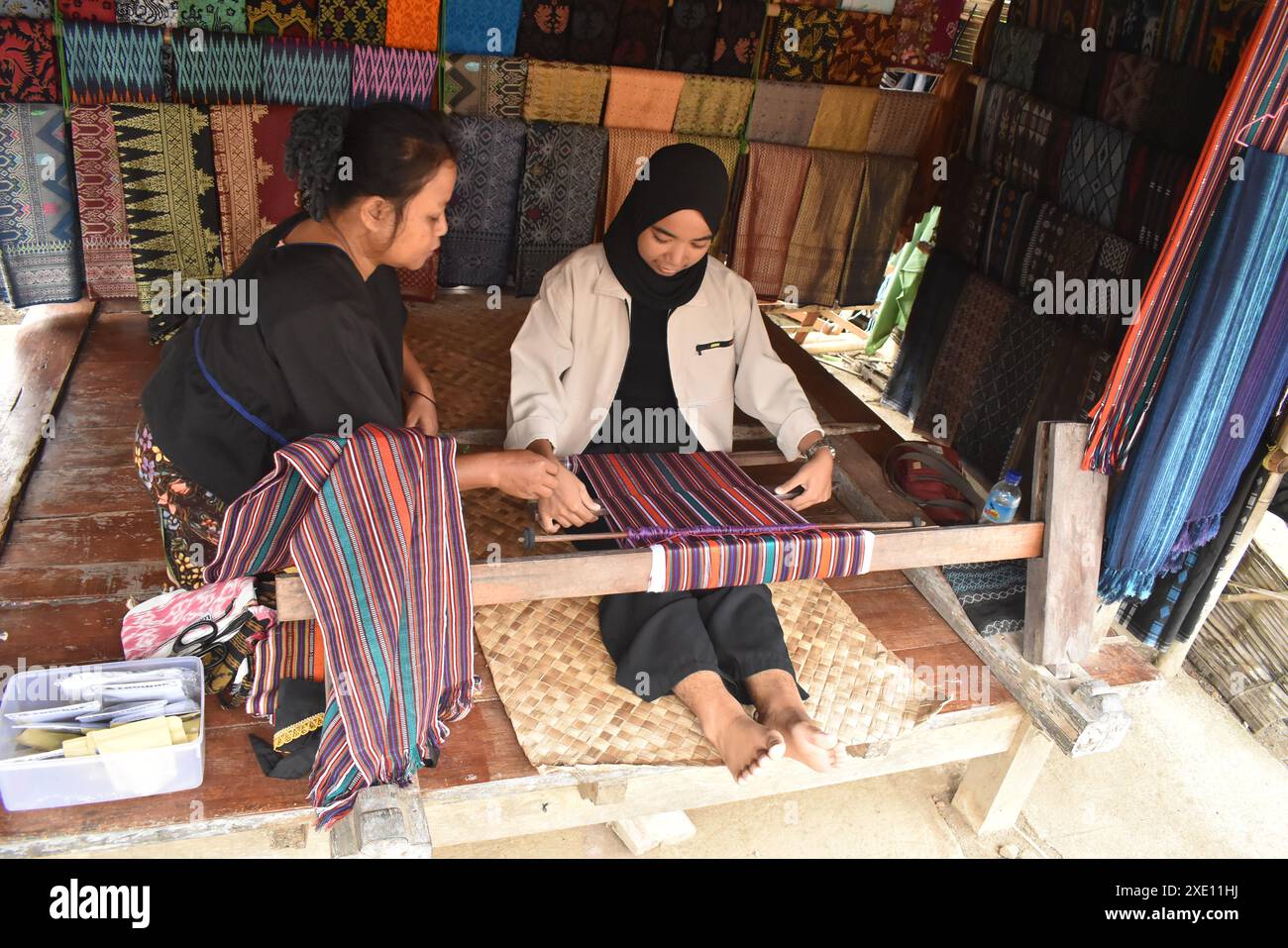learn to weave traditional cloth typical of the Sasak tribe in Sade ...