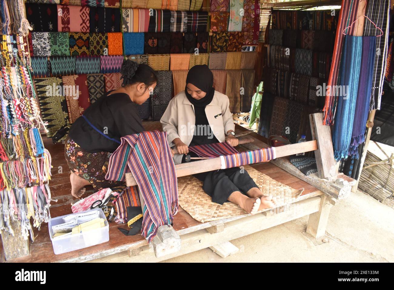 learn to weave traditional cloth typical of the Sasak tribe in Sade ...