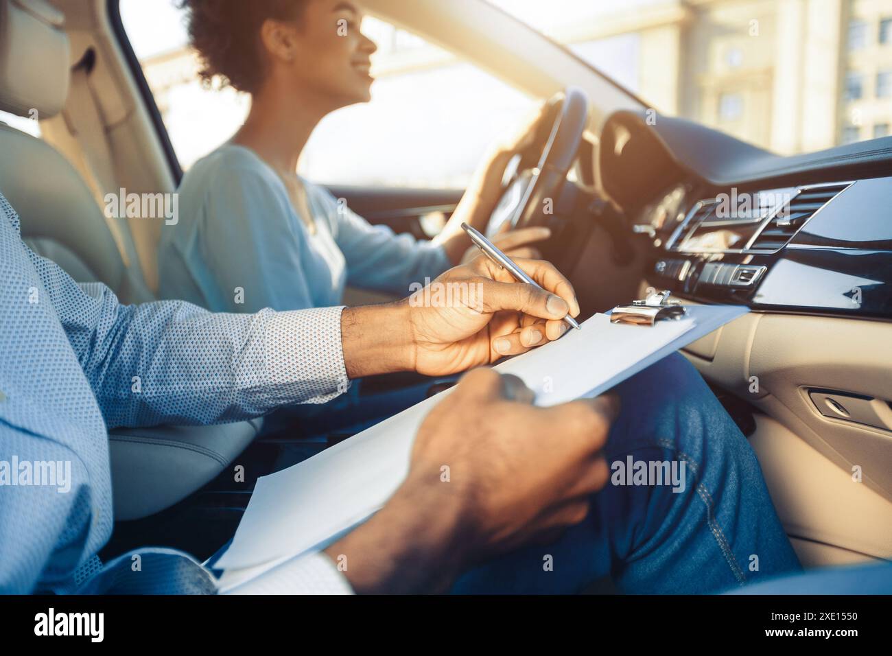 Driving Instructor Evaluating Student Woman During Lesson Stock Photo ...