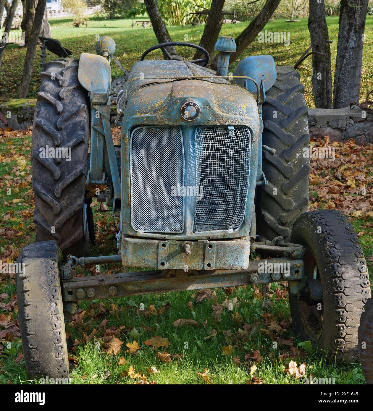 Retro rusty yellow german tractor BMW brand Stock Photo - Alamy