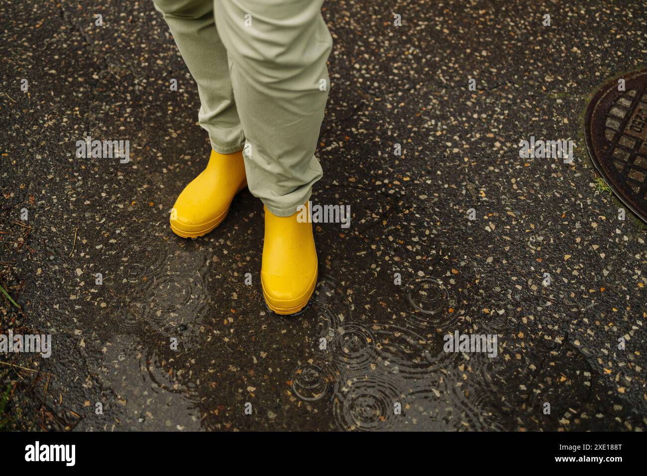 Photo of yellow rubber boots in a building under construction. These ...