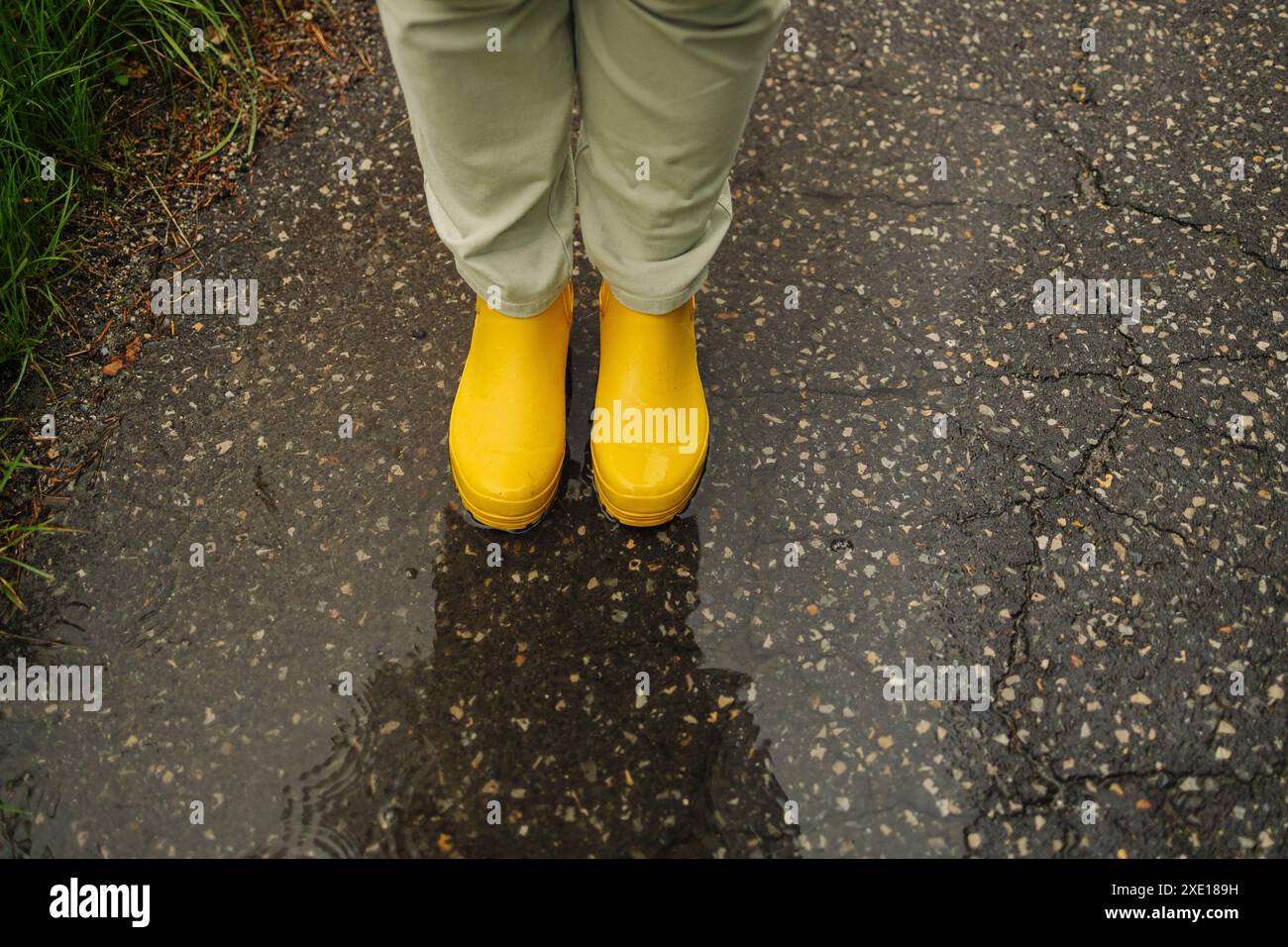 Photo of yellow rubber boots in a building under construction. These ...