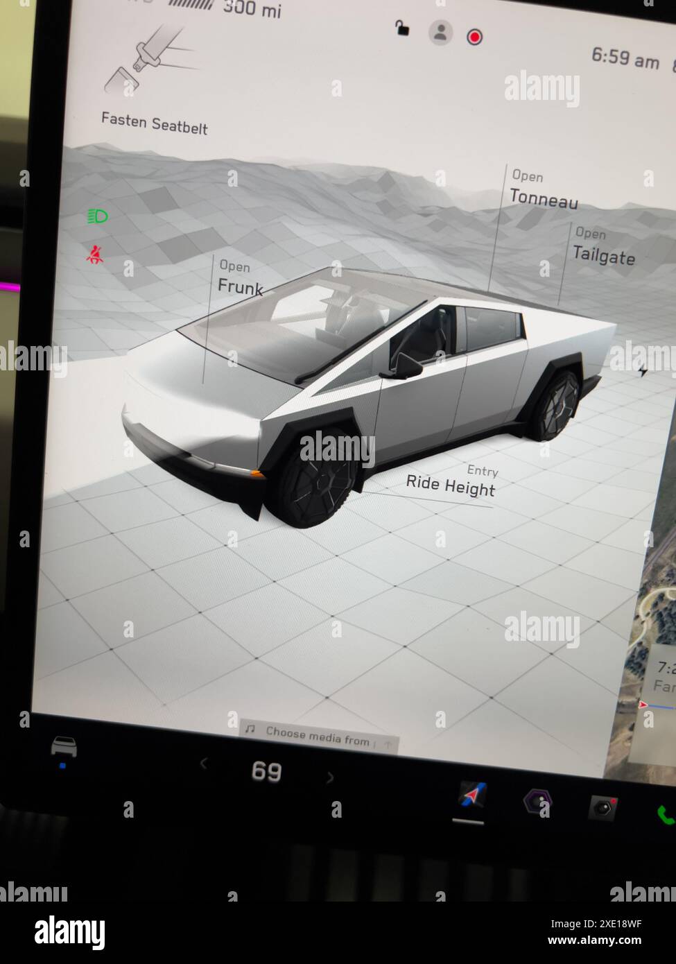 Interacting with Tesla Cybertruck Touchscreen Interface Stock Photo - Alamy