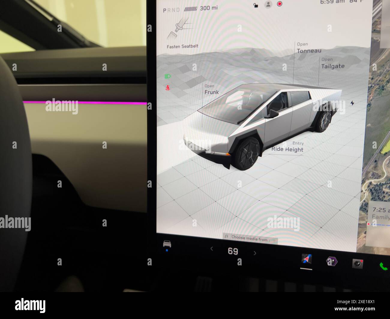 Interacting with Tesla Cybertruck Touchscreen Interface Stock Photo - Alamy
