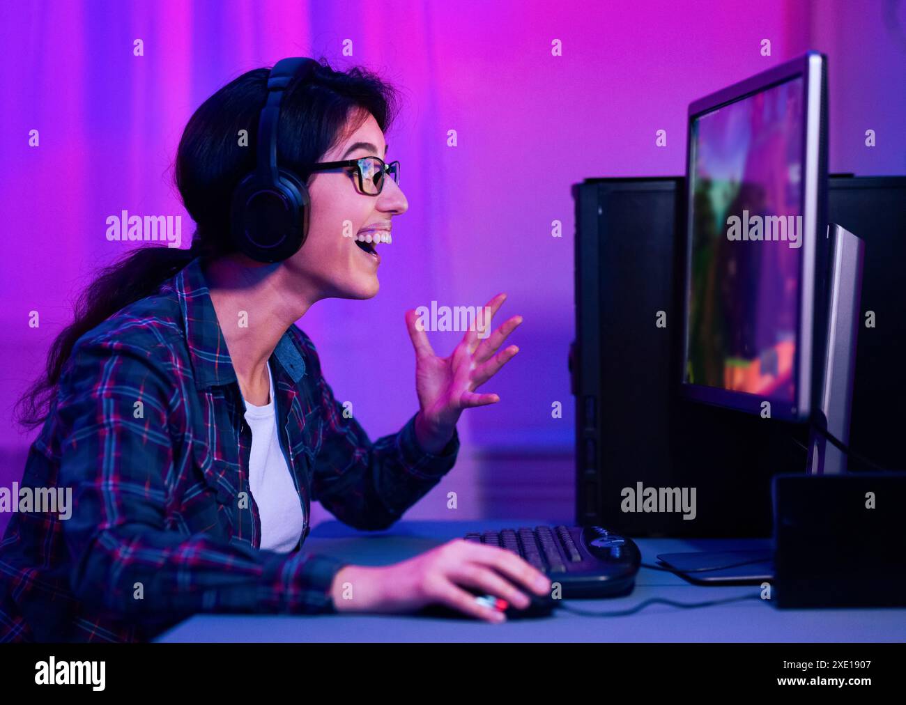 Woman gamer plays computer hi-res stock photography and images - Alamy