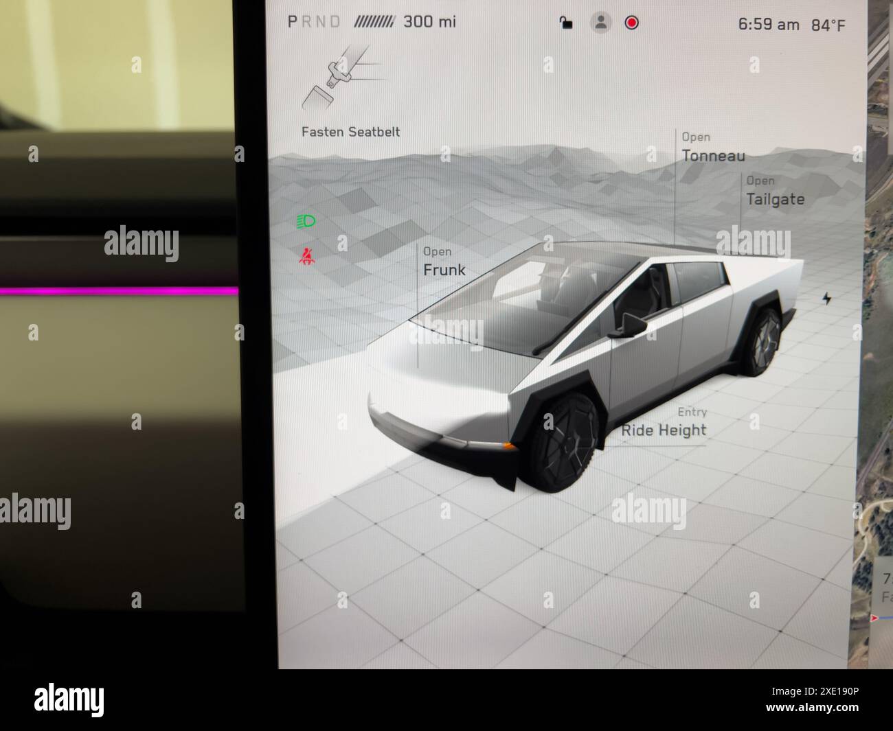 Interacting with Tesla Cybertruck Touchscreen Interface Stock Photo - Alamy