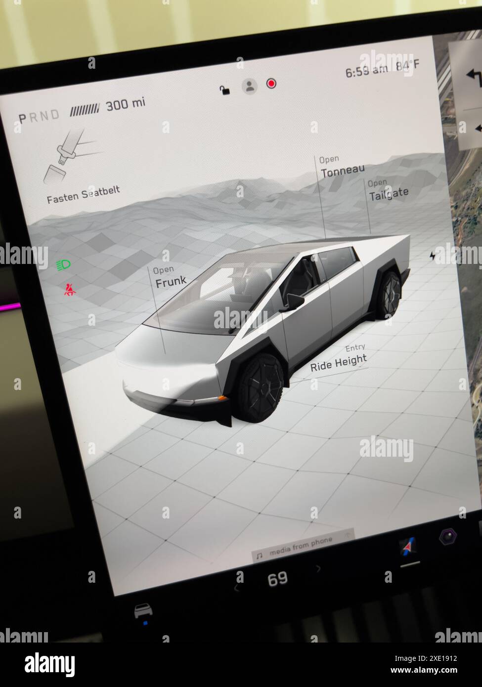 Interacting with Tesla Cybertruck Touchscreen Interface Stock Photo - Alamy