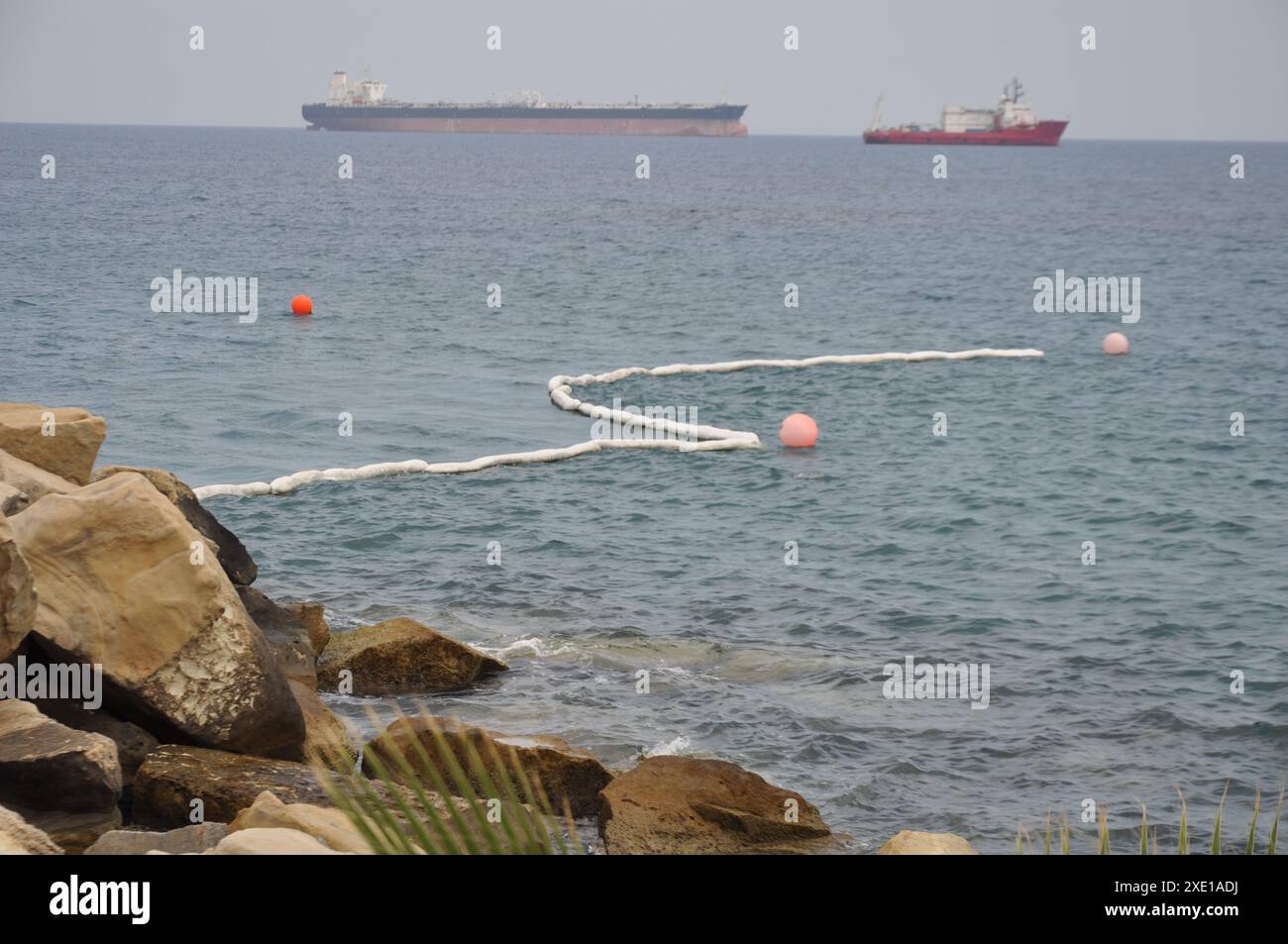 They are engaging in marine debris retrieval from floating waste Stock ...