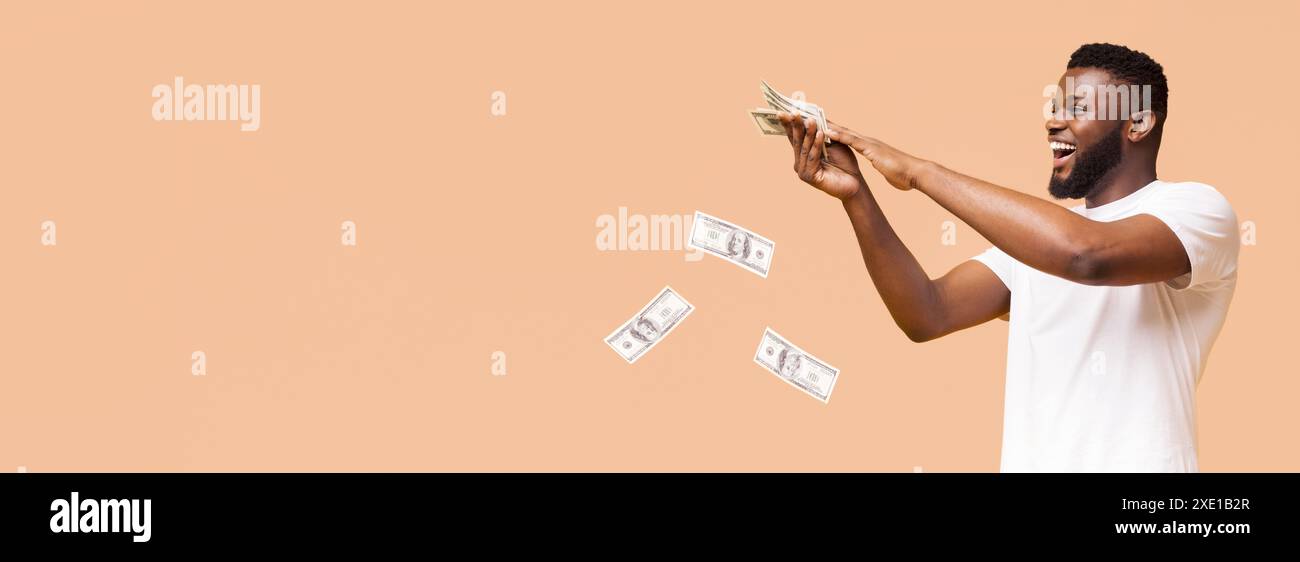 Happy Man Throwing Money in the Air Against Peach Background Stock ...