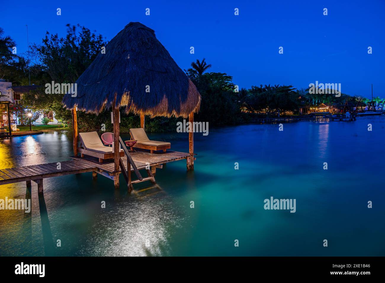 Tropical Resort in the Lagoon by night Stock Photo - Alamy