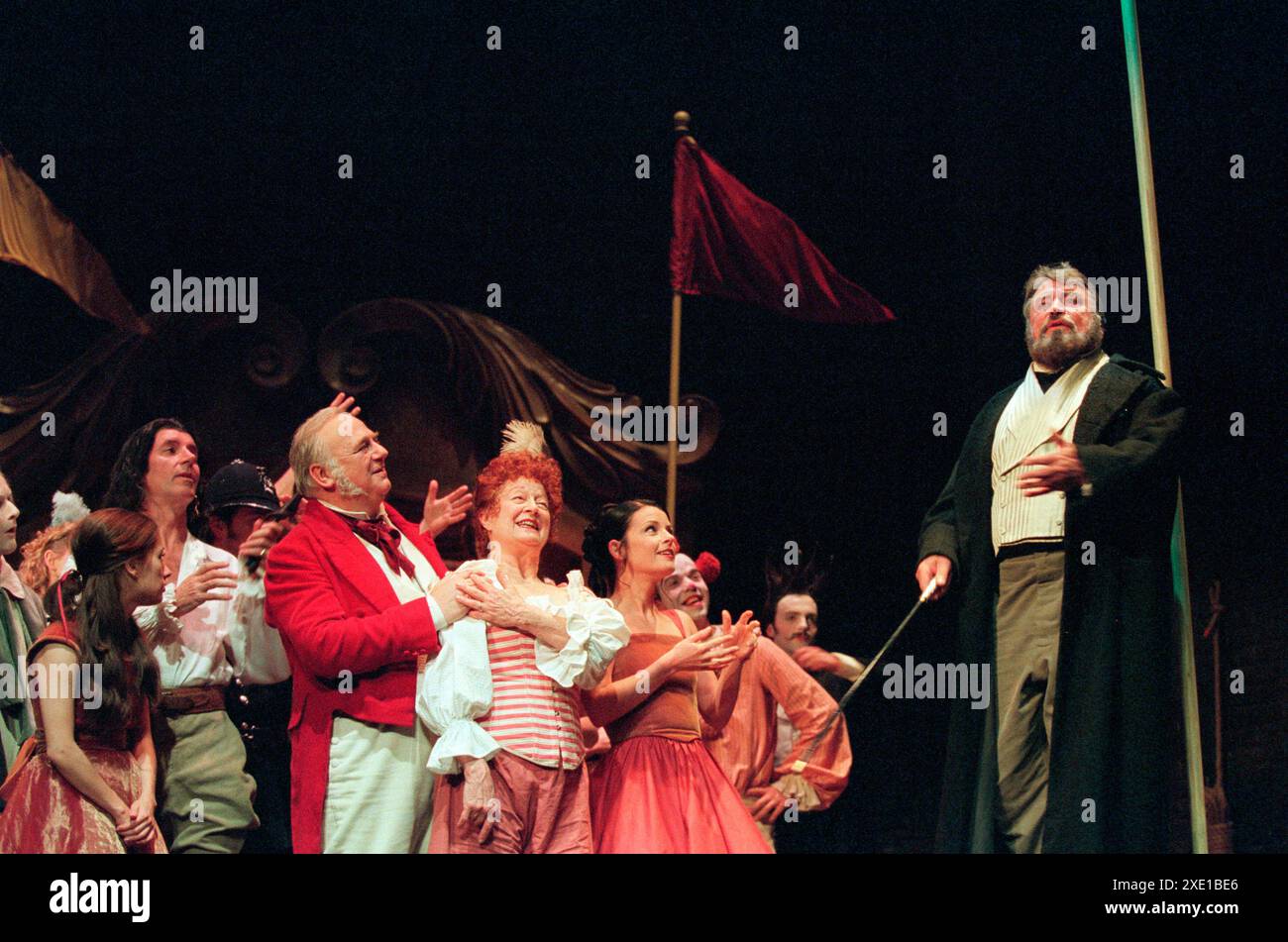 front centre: Roy Hudd (Mr Samuel Sleary), Ann Emery (Mrs Sleary) right ...