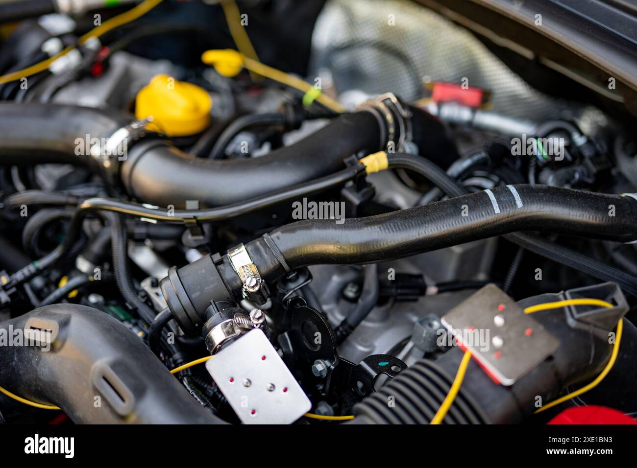 A car engine with hoses Stock Photo - Alamy