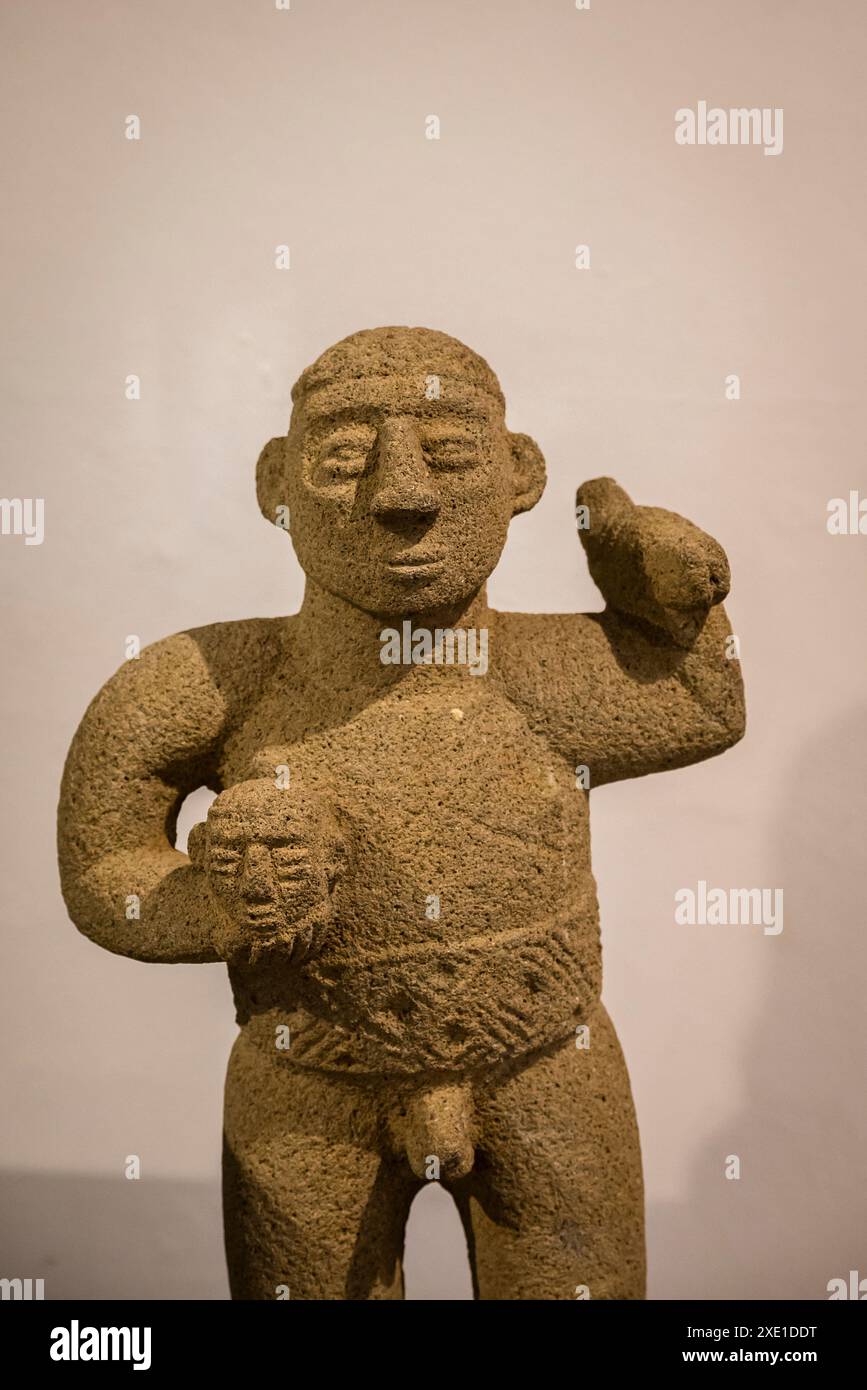 Warrior figurine with trophy scull and weapon, Pre-Columbian stone ...