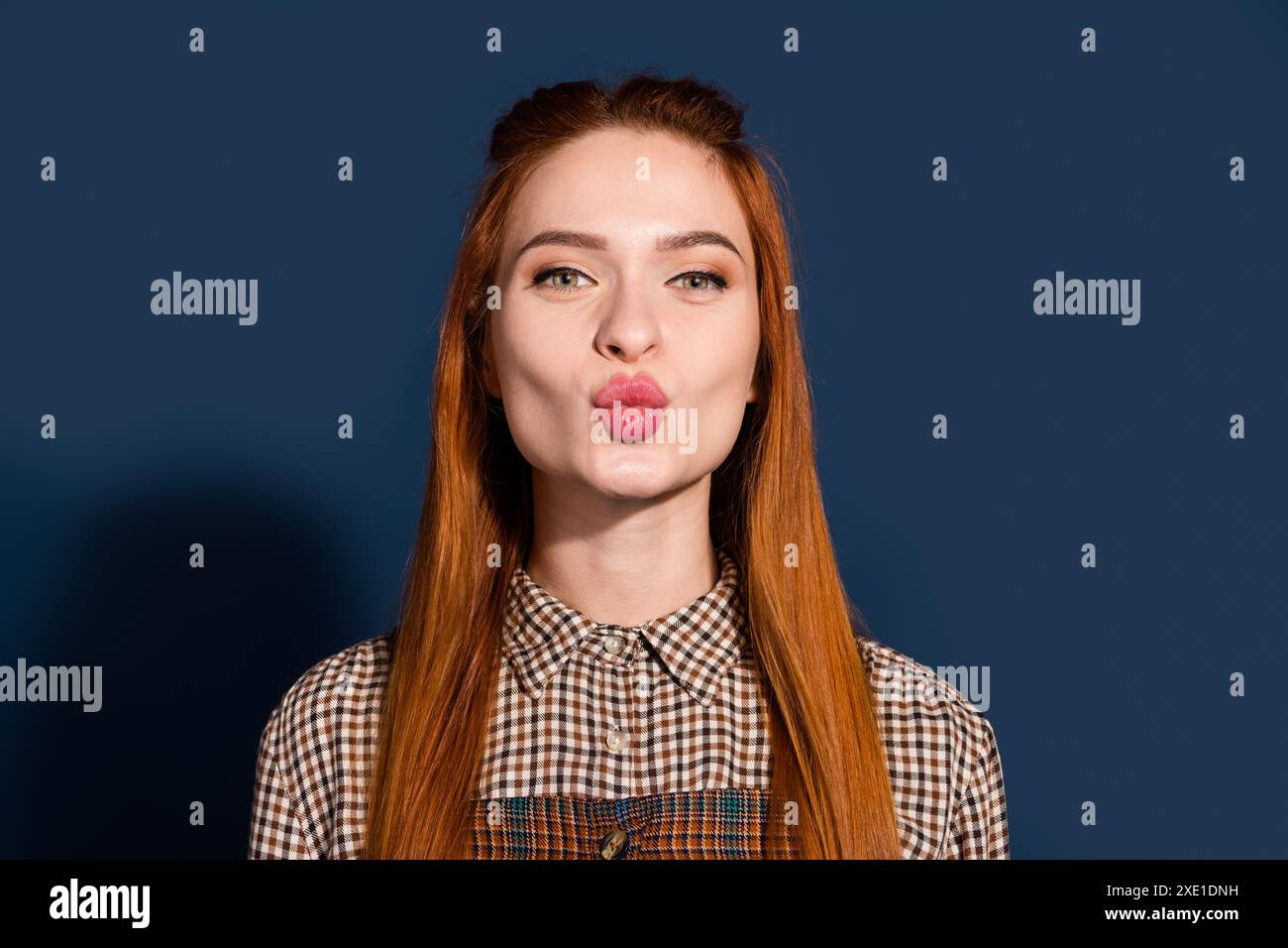 Photo of pretty flirty lady dressed plaid outfit sending you kiss ...