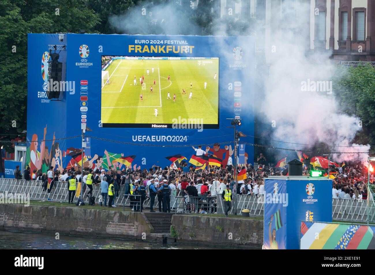 Crowd watching a UEFA Euro 2024 match on a large screen at the Euro ...
