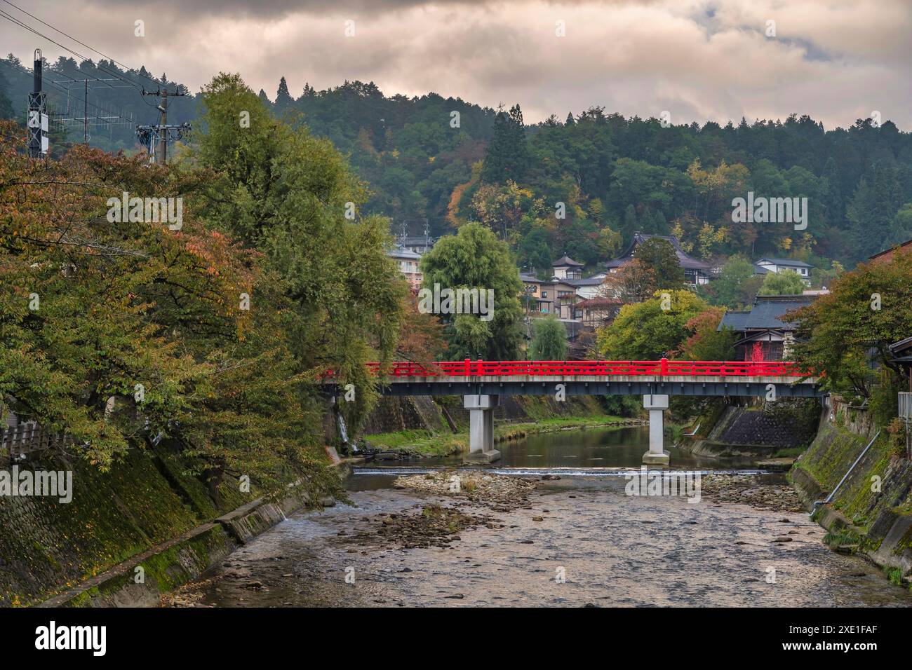 Takayama Japan, autumn landscape foliage at red Nakabashi bridge and ...