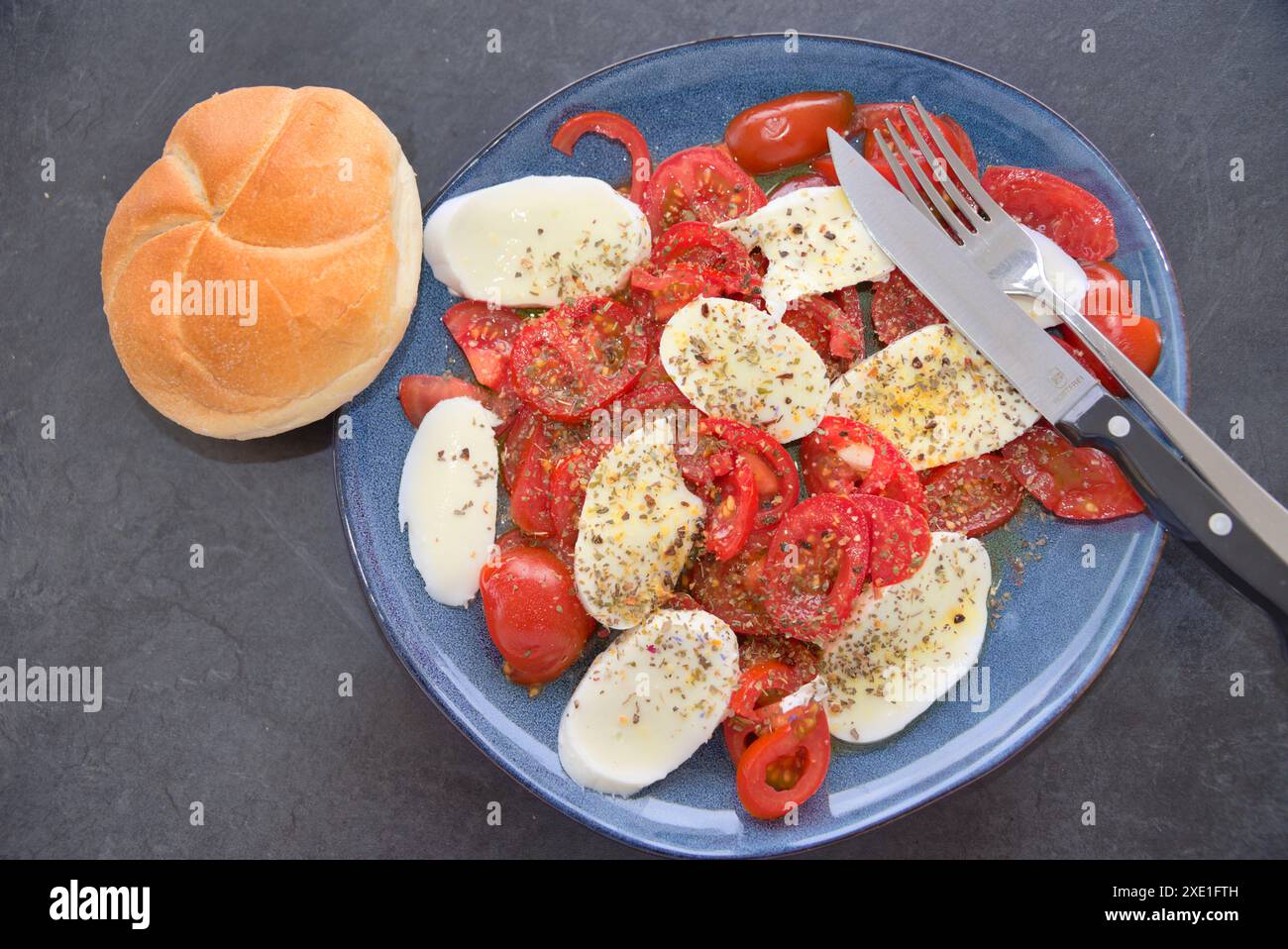 Cold plate with mozzarella and tomatoes as a starter - bite Stock Photo ...