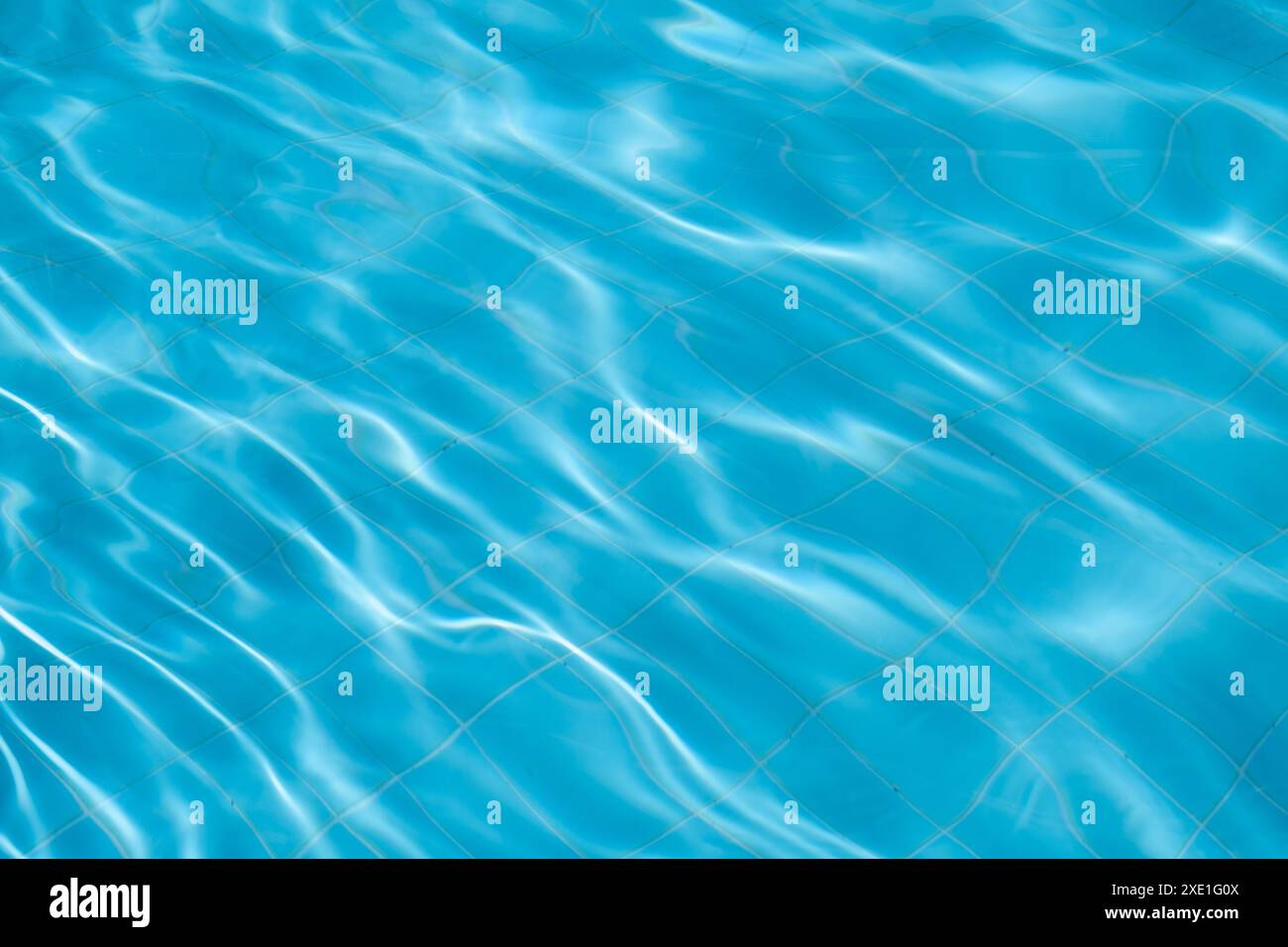 Water background, ripple and flow with waves. Summer blue swiming pool ...