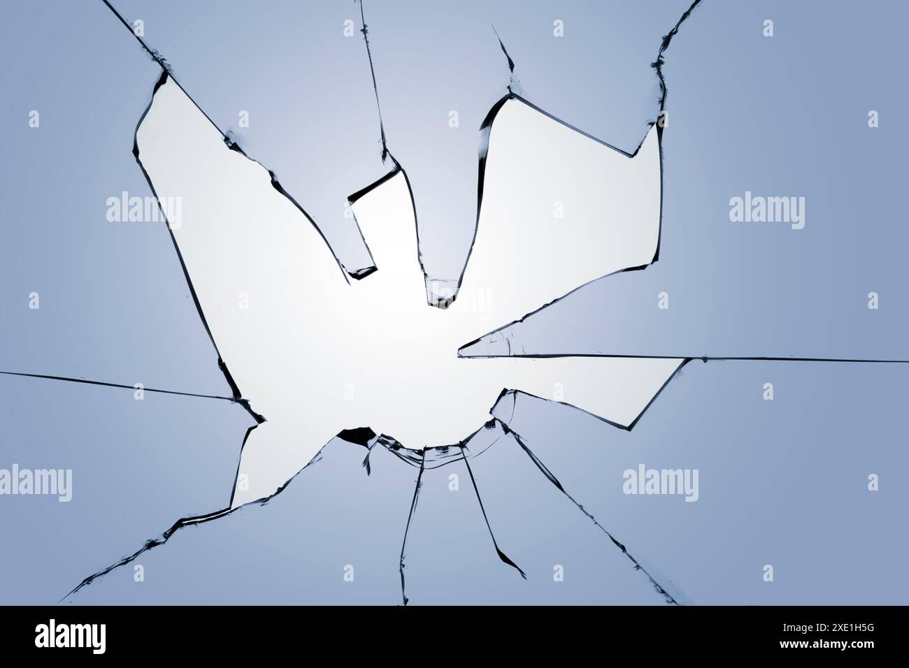 Broken glass on a blue background. Photo of a broken window with cracks ...