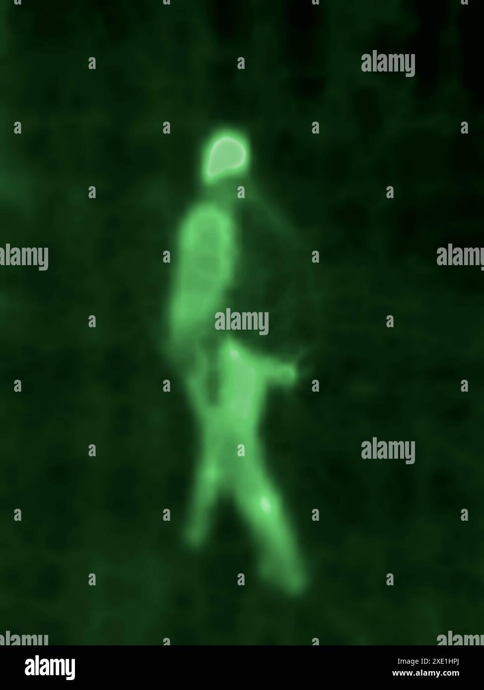 Man in the process of walking infrared Stock Photo - Alamy