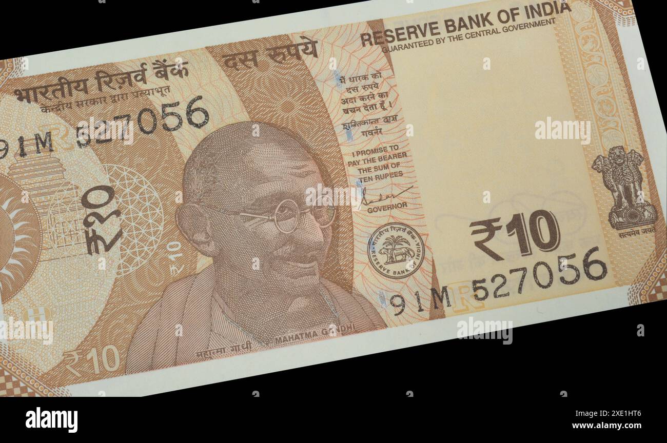 10 Rupees banknote printed by India, that shows Mahatma Gandhi and ...