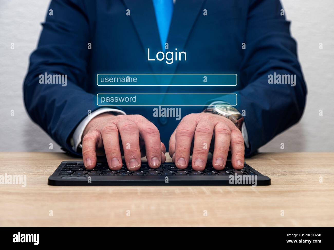Close-up of unrecognizable ma'n hands typing in a keyboard and login form floating over it to ...