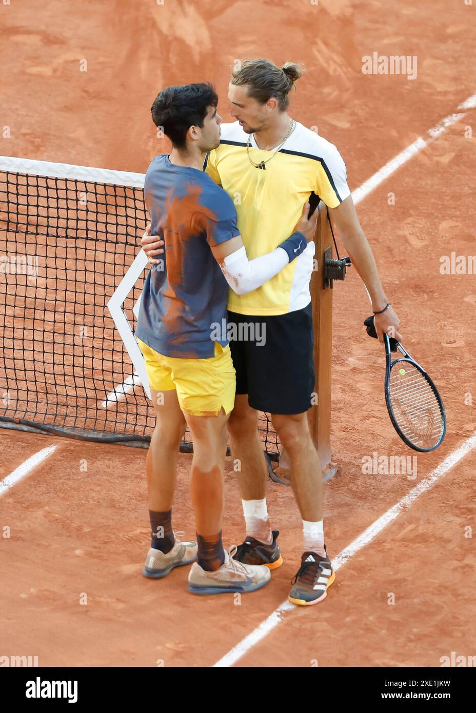 Spanish tennis player Carlos Alcaraz consoling his opponent Alexander ...