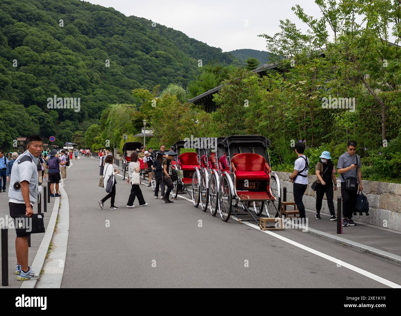Tourists are waiting to board the Jinrikisha cart in the Arashiyama ...