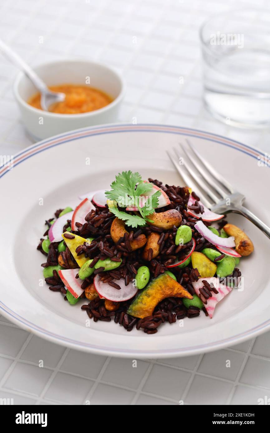 black purple rice (Thai riceberry) salad, vegan cuisine Stock Photo - Alamy
