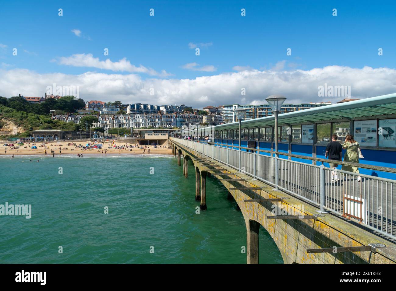 Boscombe, UK - June 23rd 2024: Couple on walking on promenade on the ...