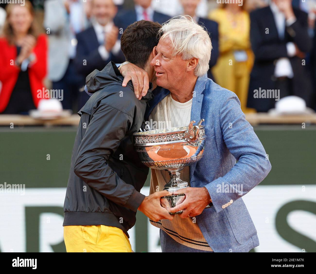 Tennis legend Bjorn Borg handing over the trophy to Carlos Alcaraz at ...