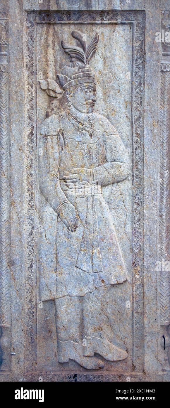 Historic stone carving of a Persian soldier Stock Photo - Alamy