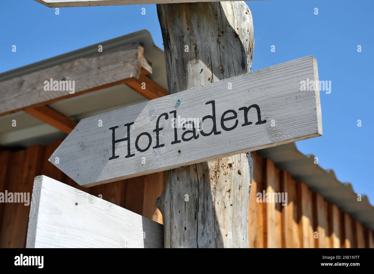 Wooden sign farm shop, Germany Stock Photo - Alamy