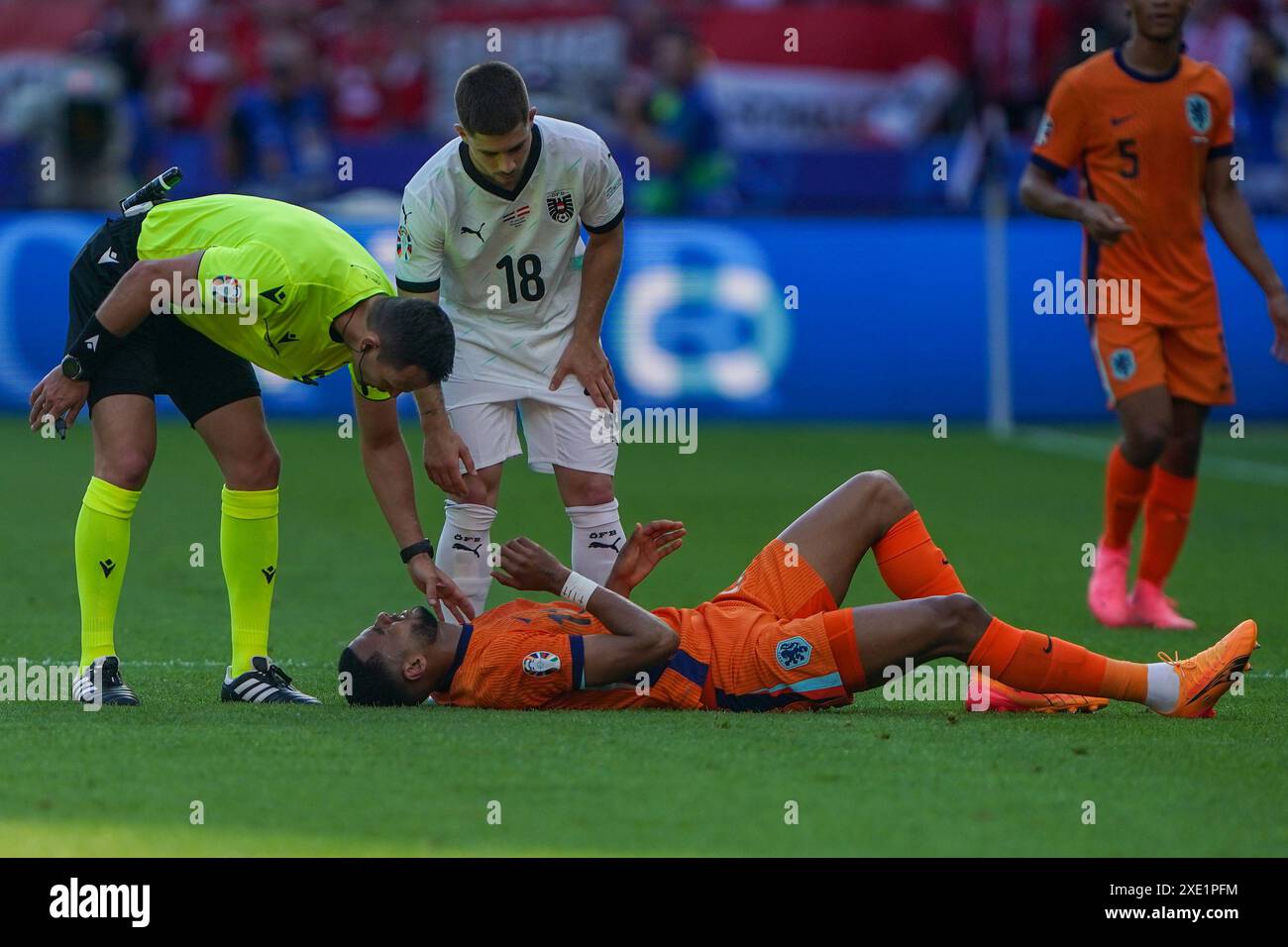 BERLIN, GERMANY - JUNE 25: Referee Ivan Kruzliak is checking on Cody ...