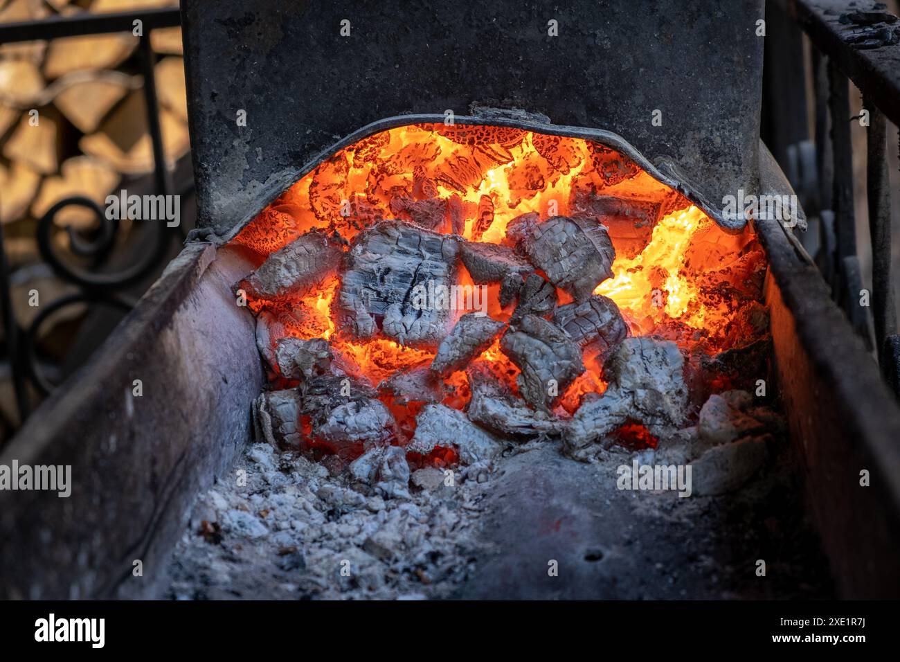 Burning coals in a metal grill for frying meat and vegetables Stock ...
