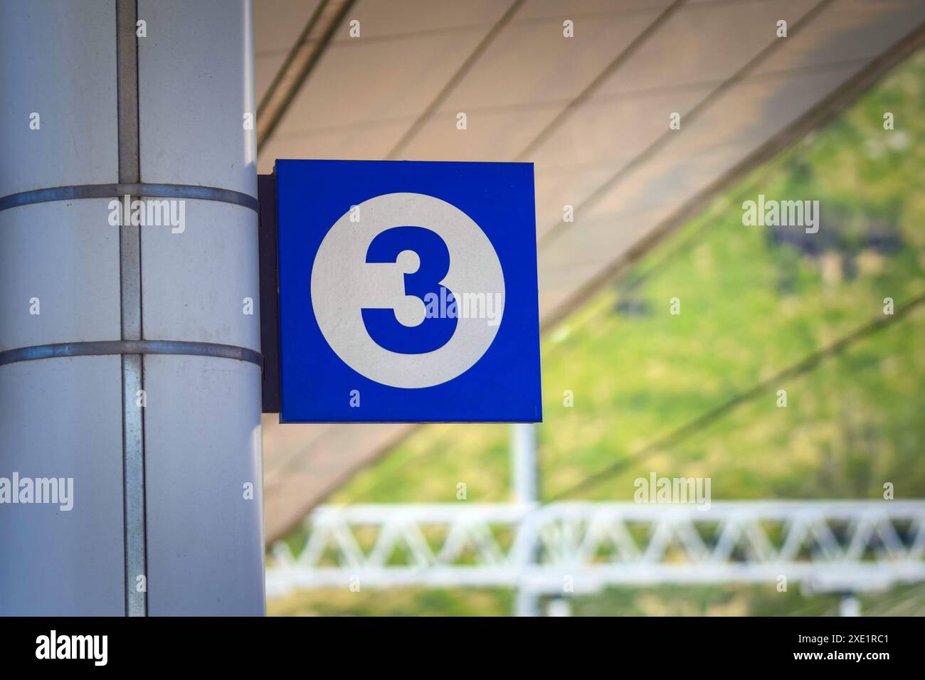 Signboard at a train station in Italy, showing the number three Stock ...