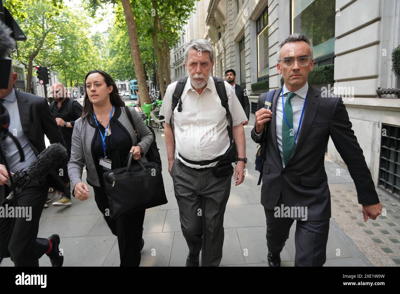 Gareth Jenkins (centre), former engineer at Fujitsu Services Ltd leaves ...