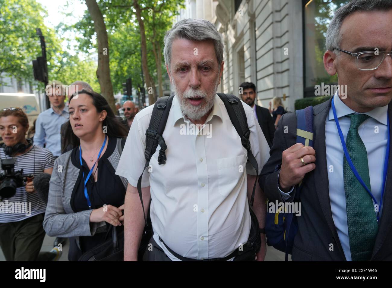 Gareth Jenkins (centre), former engineer at Fujitsu Services Ltd leaves ...